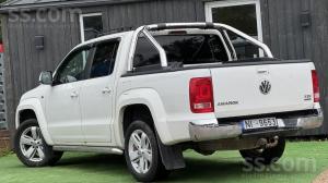 White Volkswagen Amarok 2012 in Riga, with an engine capacity of 2.00 L and mileage of 349 thousand km for 6500 €, photo 5 on AUTOMOTO.COM.LV
