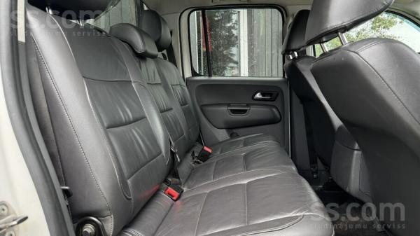 White Volkswagen Amarok 2012 in Riga, with an engine capacity of 2.00 L and mileage of 349 thousand km for 6500 €, photo 9 on AUTOMOTO.COM.LV
