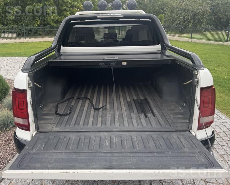 White Volkswagen Amarok 2015 in Talsi, with an engine capacity of 2.00 L and mileage of 0 thousand km for 11100 €, photo 11 on AUTOMOTO.COM.LV