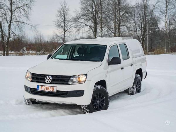 White Volkswagen Amarok 2016 in Vilnius, with an engine capacity of 1.97 L and mileage of 215 thousand km for 13350 €, photo 1 on AUTOMOTO.COM.LV