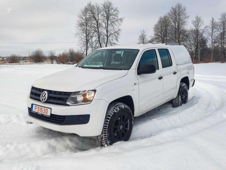 White Volkswagen Amarok 2016 in Vilnius, with an engine capacity of 1.97 L and mileage of 215 thousand km for 13350 €, photo 2 on AUTOMOTO.COM.LV