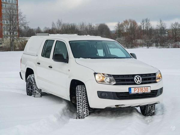White Volkswagen Amarok 2016 in Vilnius, with an engine capacity of 1.97 L and mileage of 215 thousand km for 13350 €, photo 4 on AUTOMOTO.COM.LV