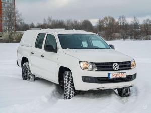 White Volkswagen Amarok 2016 in Vilnius, with an engine capacity of 1.97 L and mileage of 215 thousand km for 13350 €, photo 4 on AUTOMOTO.COM.LV