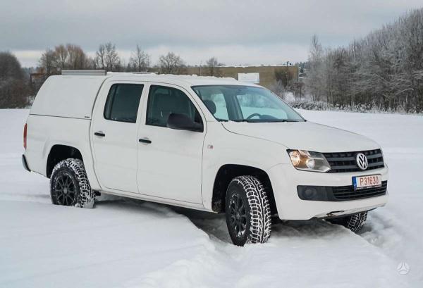 White Volkswagen Amarok 2016 in Vilnius, with an engine capacity of 1.97 L and mileage of 215 thousand km for 13350 €, photo 5 on AUTOMOTO.COM.LV