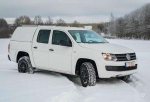 White Volkswagen Amarok 2016 in Vilnius, with an engine capacity of 1.97 L and mileage of 215 thousand km for 13350 €, photo 5 on AUTOMOTO.COM.LV