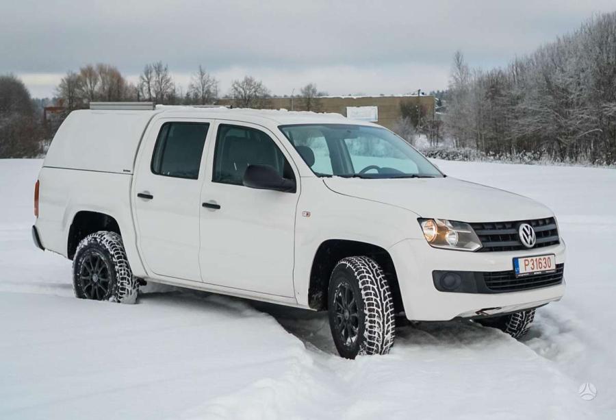 White Volkswagen Amarok 2016 in Vilnius, with an engine capacity of 1.97 L and mileage of 215 thousand km for 13350 €, photo 5 on AUTOMOTO.COM.LV