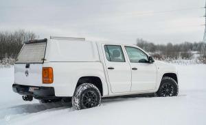White Volkswagen Amarok 2016 in Vilnius, with an engine capacity of 1.97 L and mileage of 215 thousand km for 13350 €, photo 6 on AUTOMOTO.COM.LV