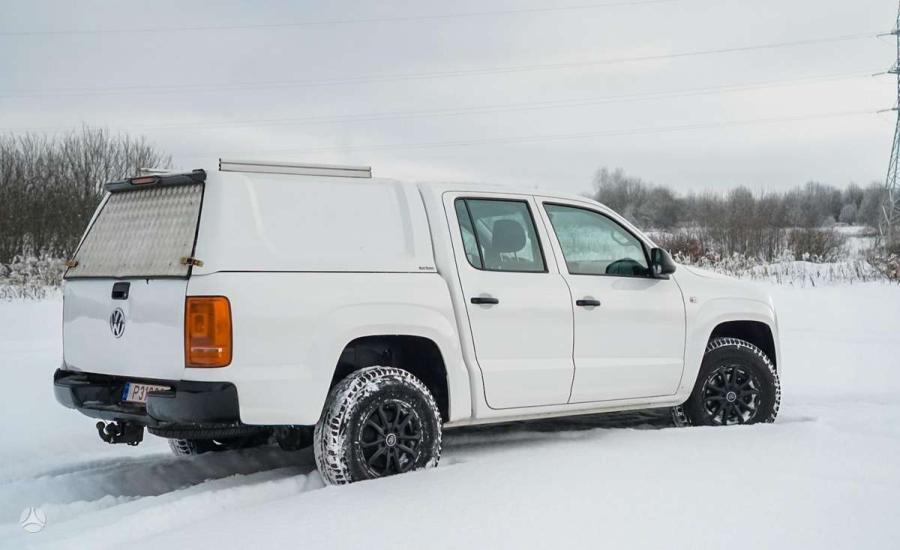 White Volkswagen Amarok 2016 in Vilnius, with an engine capacity of 1.97 L and mileage of 215 thousand km for 13350 €, photo 6 on AUTOMOTO.COM.LV
