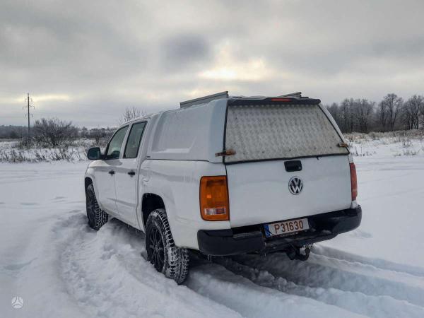 White Volkswagen Amarok 2016 in Vilnius, with an engine capacity of 1.97 L and mileage of 215 thousand km for 13350 €, photo 7 on AUTOMOTO.COM.LV