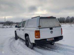 White Volkswagen Amarok 2016 in Vilnius, with an engine capacity of 1.97 L and mileage of 215 thousand km for 13350 €, photo 7 on AUTOMOTO.COM.LV