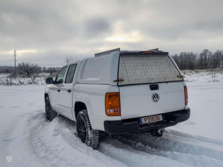 White Volkswagen Amarok 2016 in Vilnius, with an engine capacity of 1.97 L and mileage of 215 thousand km for 13350 €, photo 7 on AUTOMOTO.COM.LV