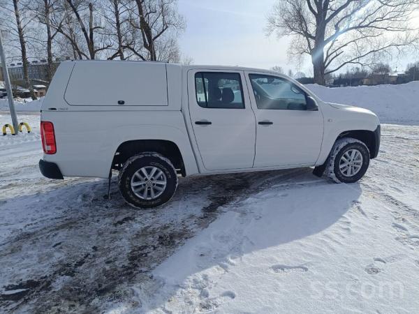White Volkswagen Amarok 2016 in Riga, with an engine capacity of 2.00 L and mileage of 102 thousand km for 17200 €, photo 1 on AUTOMOTO.COM.LV