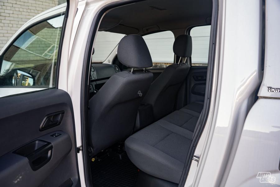 White Volkswagen Amarok 2016 in Vilnius, with an engine capacity of 2.00 L and mileage of 215 thousand km for 10990 €, photo 13 on AUTOMOTO.COM.LV