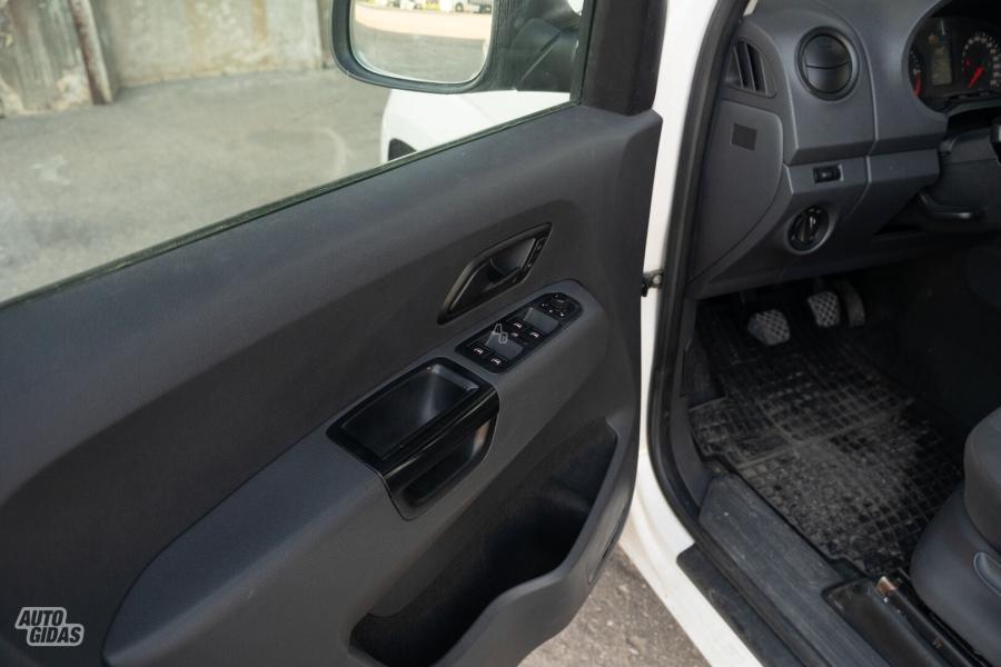 White Volkswagen Amarok 2016 in Vilnius, with an engine capacity of 2.00 L and mileage of 215 thousand km for 10990 €, photo 18 on AUTOMOTO.COM.LV