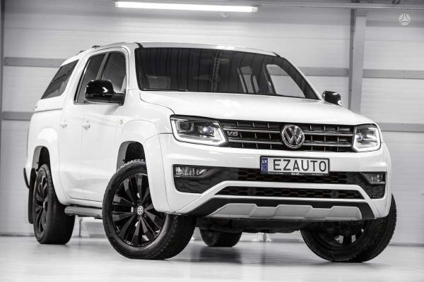 White Volkswagen Amarok 2020 in Tukums, with an engine capacity of 2.97 L and mileage of 185 thousand km for 25700 €, photo 2 on AUTOMOTO.COM.LV