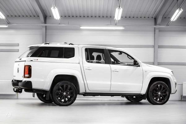White Volkswagen Amarok 2020 in Tukums, with an engine capacity of 2.97 L and mileage of 185 thousand km for 25700 €, photo 3 on AUTOMOTO.COM.LV