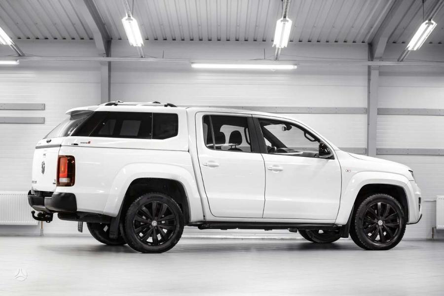 White Volkswagen Amarok 2020 in Tukums, with an engine capacity of 2.97 L and mileage of 185 thousand km for 25700 €, photo 3 on AUTOMOTO.COM.LV