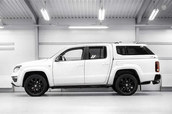 White Volkswagen Amarok 2020 in Tukums, with an engine capacity of 2.97 L and mileage of 185 thousand km for 25700 €, photo 7 on AUTOMOTO.COM.LV