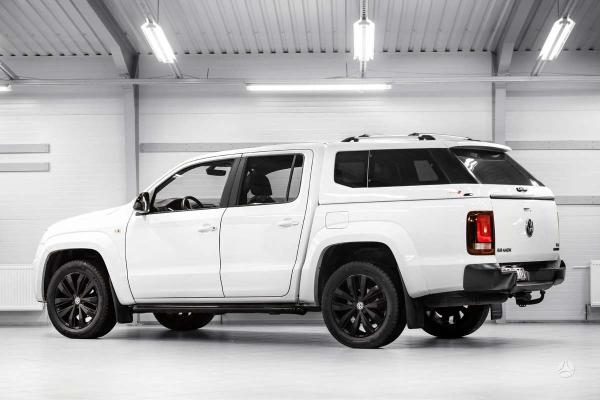 White Volkswagen Amarok 2020 in Tukums, with an engine capacity of 2.97 L and mileage of 185 thousand km for 25700 €, photo 8 on AUTOMOTO.COM.LV