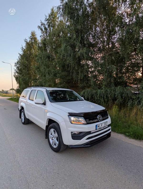 White Volkswagen Amarok 2020 in Vilnius, with an engine capacity of 2.97 L and mileage of 238 thousand km for 17999 €, photo 7 on AUTOMOTO.COM.LV