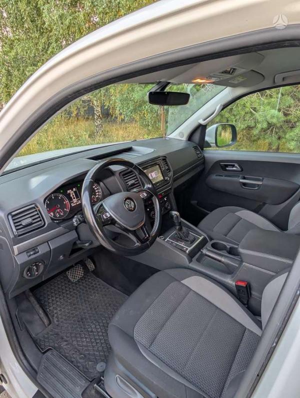 White Volkswagen Amarok 2020 in Vilnius, with an engine capacity of 2.97 L and mileage of 238 thousand km for 17999 €, photo 8 on AUTOMOTO.COM.LV