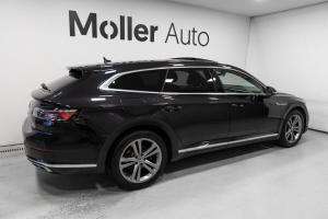 Black Volkswagen Arteon 2023 in Vilnius, with an engine capacity of 1.40 L and mileage of 131 thousand km for 24500 €, photo 5 on AUTOMOTO.COM.LV