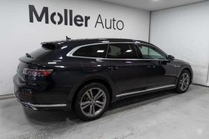 Black Volkswagen Arteon 2021 in Vilnius, with an engine capacity of 1.40 L and mileage of 112 thousand km for 23900 €, photo 3 on AUTOMOTO.COM.LV