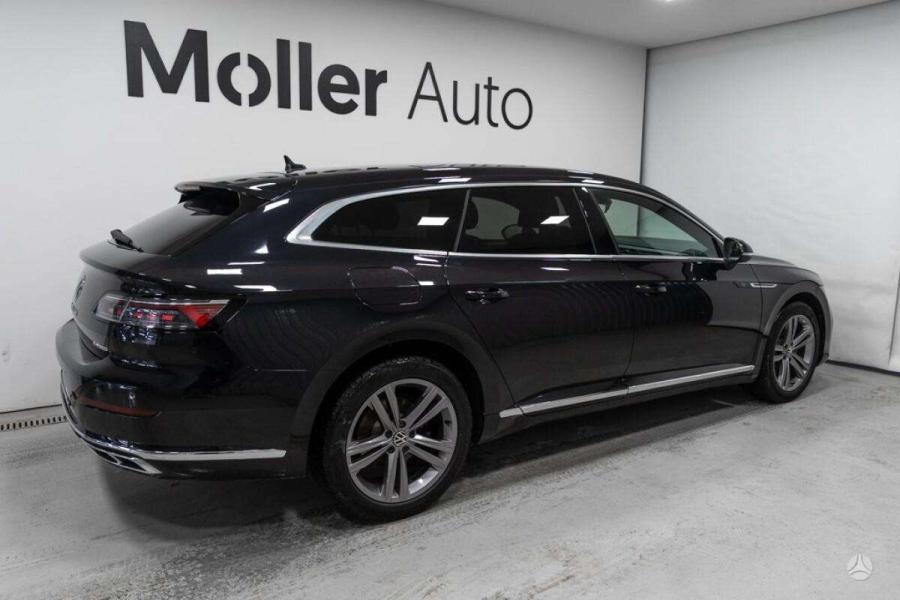 Black Volkswagen Arteon 2021 in Vilnius, with an engine capacity of 1.40 L and mileage of 112 thousand km for 23900 €, photo 3 on AUTOMOTO.COM.LV
