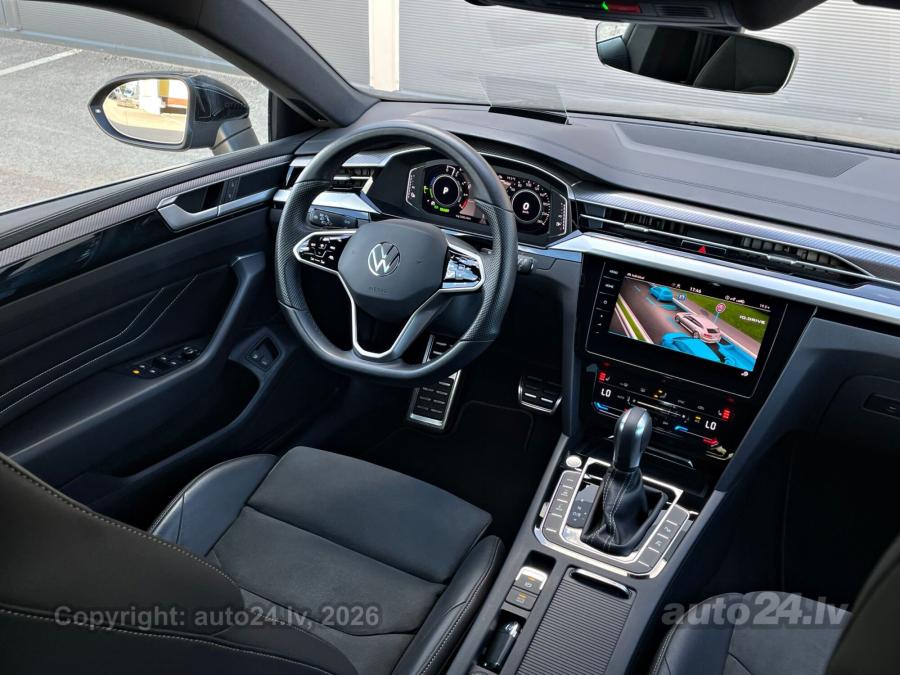 Black Volkswagen Arteon 2021 in Tallinn, with an engine capacity of 1.40 L and mileage of 69 thousand km for 27500 €, photo 11 on AUTOMOTO.COM.LV