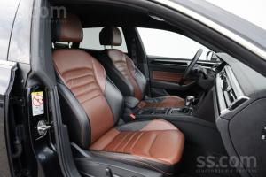 Black Volkswagen Arteon 2022 in Riga, with an engine capacity of 1.40 L and mileage of 142 thousand km for 22900 €, photo 8 on AUTOMOTO.COM.LV