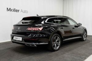 Black Volkswagen Arteon 2023 in Tallinn, with an engine capacity of 2.00 L and mileage of 154 thousand km for 26900 €, photo 5 on AUTOMOTO.COM.LV