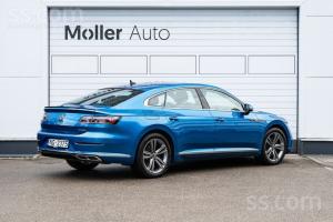 Blue Volkswagen Arteon 2022 in Riga, with an engine capacity of 1.40 L and mileage of 72 thousand km for 22950 €, photo 5 on AUTOMOTO.COM.LV