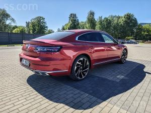Red Volkswagen Arteon 2022 in Riga, with an engine capacity of 2.00 L and mileage of 117 thousand km for 30500 €, photo 6 on AUTOMOTO.COM.LV