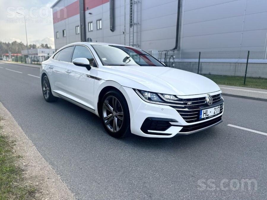 White Volkswagen Arteon 2018 in Riga, with an engine capacity of 2.00 L and mileage of 184 thousand km for 29750 €, photo 1 on AUTOMOTO.COM.LV