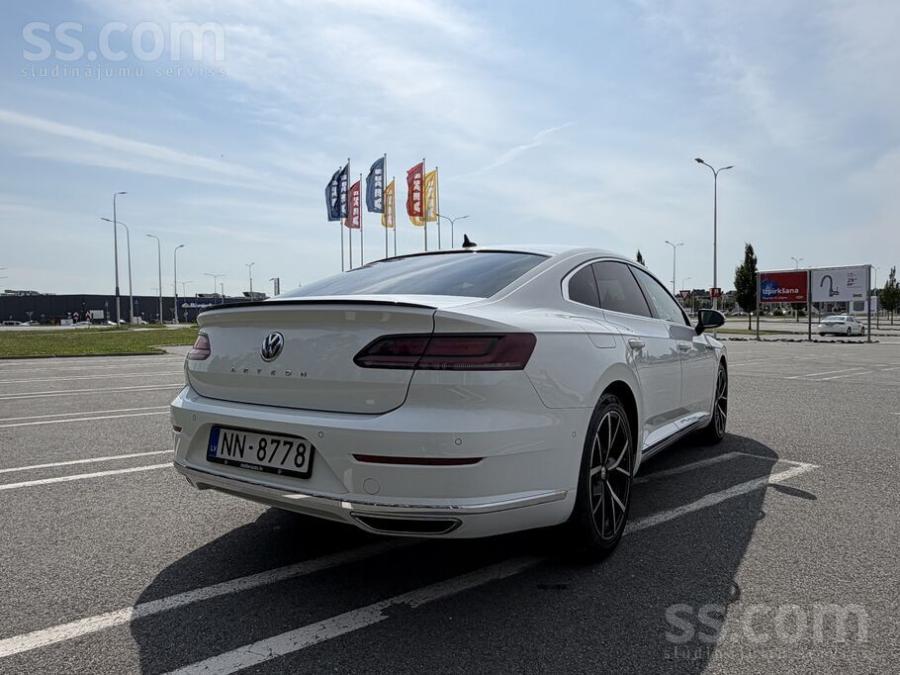 White Volkswagen Arteon 2020 in Riga, with an engine capacity of 2.00 L and mileage of 131 thousand km for 22999 €, photo 4 on AUTOMOTO.COM.LV