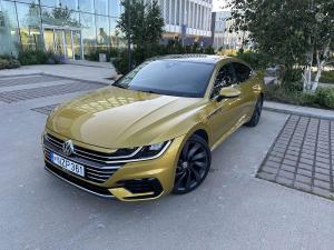 Yellow Volkswagen Arteon 2019 in Vilnius, with an engine capacity of 1.98 L and mileage of 134 thousand km for 18700 €, photo  on AUTOMOTO.COM.LV