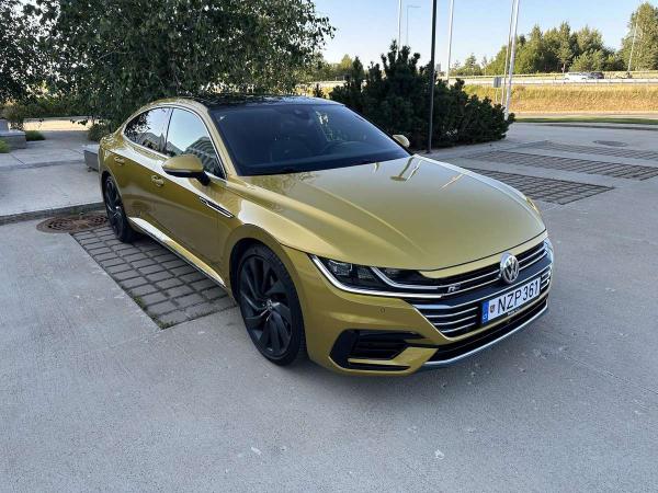 Yellow Volkswagen Arteon 2019 in Vilnius, with an engine capacity of 1.98 L and mileage of 134 thousand km for 18700 €, photo 3 on AUTOMOTO.COM.LV