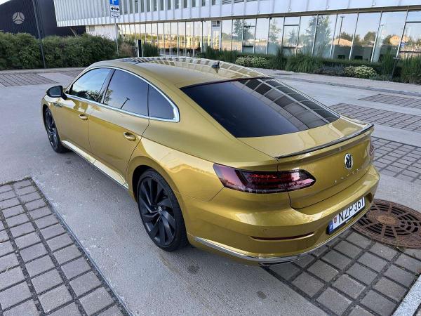 Yellow Volkswagen Arteon 2019 in Vilnius, with an engine capacity of 1.98 L and mileage of 134 thousand km for 18700 €, photo 6 on AUTOMOTO.COM.LV