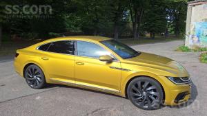 Yellow Volkswagen Arteon 2019 in Riga, with an engine capacity of 2.00 L and mileage of 59 thousand km for 22300 €, photo  on AUTOMOTO.COM.LV