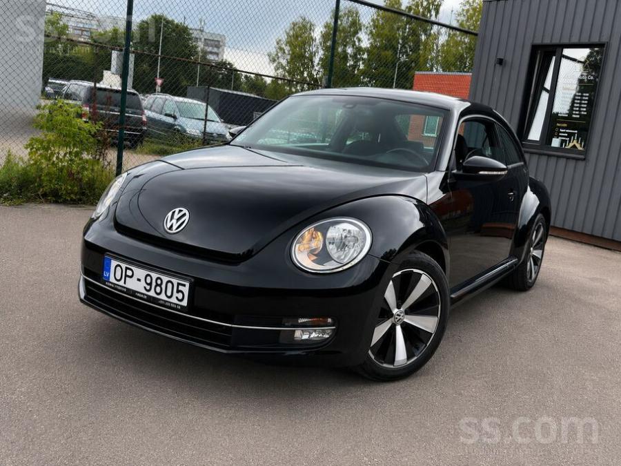 Black Volkswagen Beetle 2011 in Riga, with an engine capacity of 2.00 L and mileage of 215 thousand km for 7990 €, photo 1 on AUTOMOTO.COM.LV