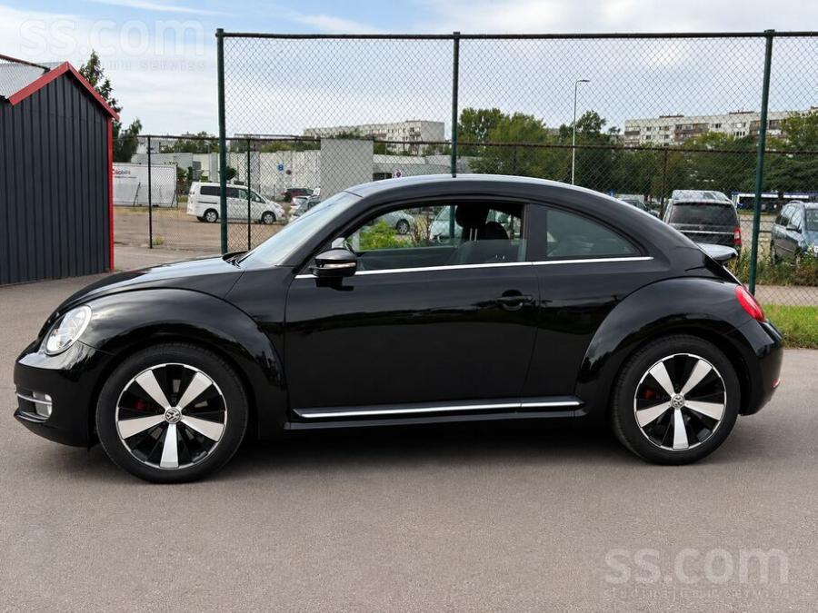 Black Volkswagen Beetle 2011 in Riga, with an engine capacity of 2.00 L and mileage of 215 thousand km for 7990 €, photo 3 on AUTOMOTO.COM.LV