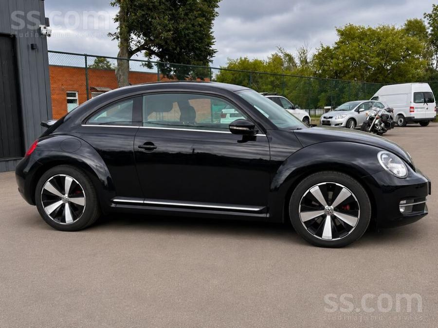 Black Volkswagen Beetle 2011 in Riga, with an engine capacity of 2.00 L and mileage of 215 thousand km for 7990 €, photo 5 on AUTOMOTO.COM.LV