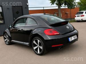 Black Volkswagen Beetle 2011 in Riga, with an engine capacity of 2.00 L and mileage of 215 thousand km for 7990 €, photo 7 on AUTOMOTO.COM.LV