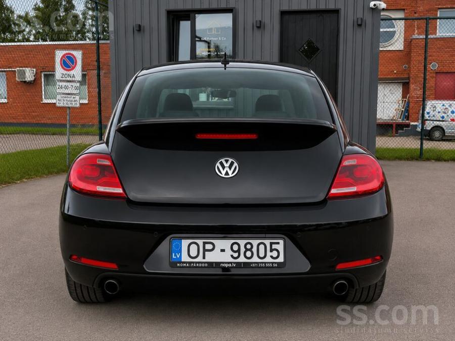 Black Volkswagen Beetle 2011 in Riga, with an engine capacity of 2.00 L and mileage of 215 thousand km for 7990 €, photo 8 on AUTOMOTO.COM.LV