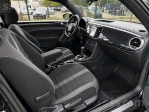 Black Volkswagen Beetle 2011 in Riga, with an engine capacity of 2.00 L and mileage of 215 thousand km for 7990 €, photo 10 on AUTOMOTO.COM.LV