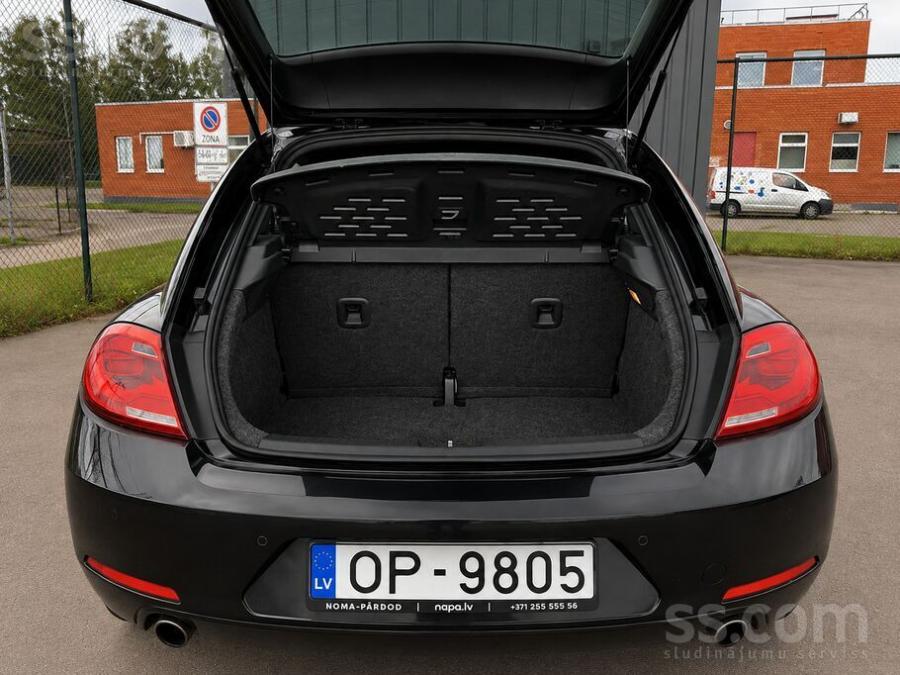 Black Volkswagen Beetle 2011 in Riga, with an engine capacity of 2.00 L and mileage of 215 thousand km for 7990 €, photo 11 on AUTOMOTO.COM.LV