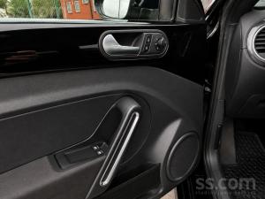 Black Volkswagen Beetle 2011 in Riga, with an engine capacity of 2.00 L and mileage of 215 thousand km for 7990 €, photo 13 on AUTOMOTO.COM.LV