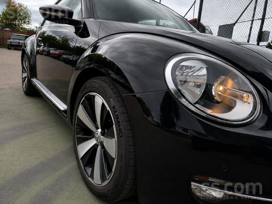 Black Volkswagen Beetle 2011 in Riga, with an engine capacity of 2.00 L and mileage of 215 thousand km for 7990 €, photo 20 on AUTOMOTO.COM.LV