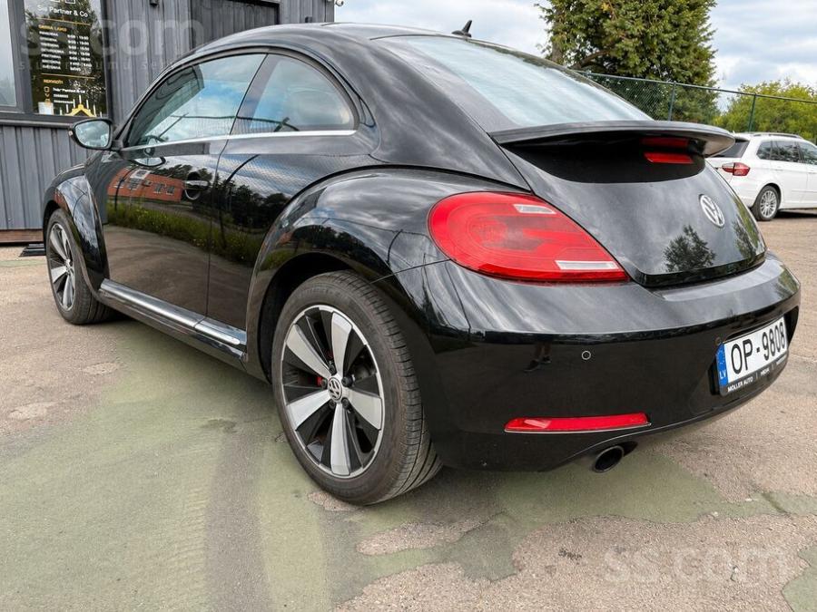 Black Volkswagen Beetle 2011 in Riga, with an engine capacity of 2.00 L and mileage of 215 thousand km for 7990 €, photo 22 on AUTOMOTO.COM.LV
