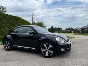 Black Volkswagen Beetle 2011 in Riga, with an engine capacity of 2.00 L and mileage of 215 thousand km for 7900 €, photo  on AUTOMOTO.COM.LV